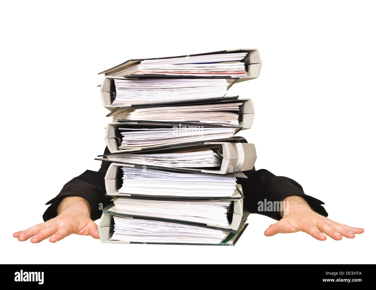 Human behind a stack of Ring Binders Stock Photo - Alamy