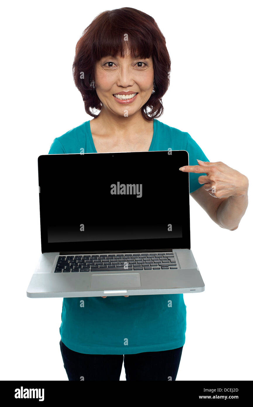 Saleswoman presenting you brand new laptop. All on white background ...