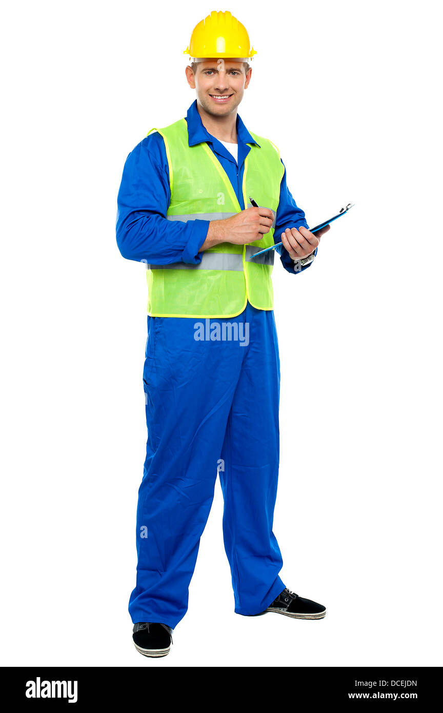 Full length portrait of male architect signing business documents Stock ...