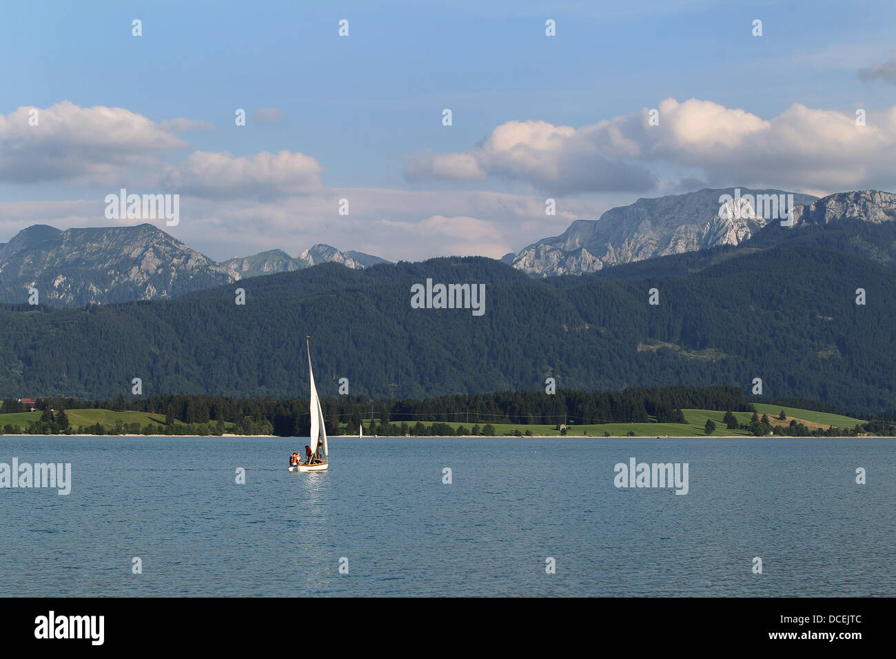 A sail boat on Forggensee Lake near Dietringen, Germany, 15 August 2013 ...