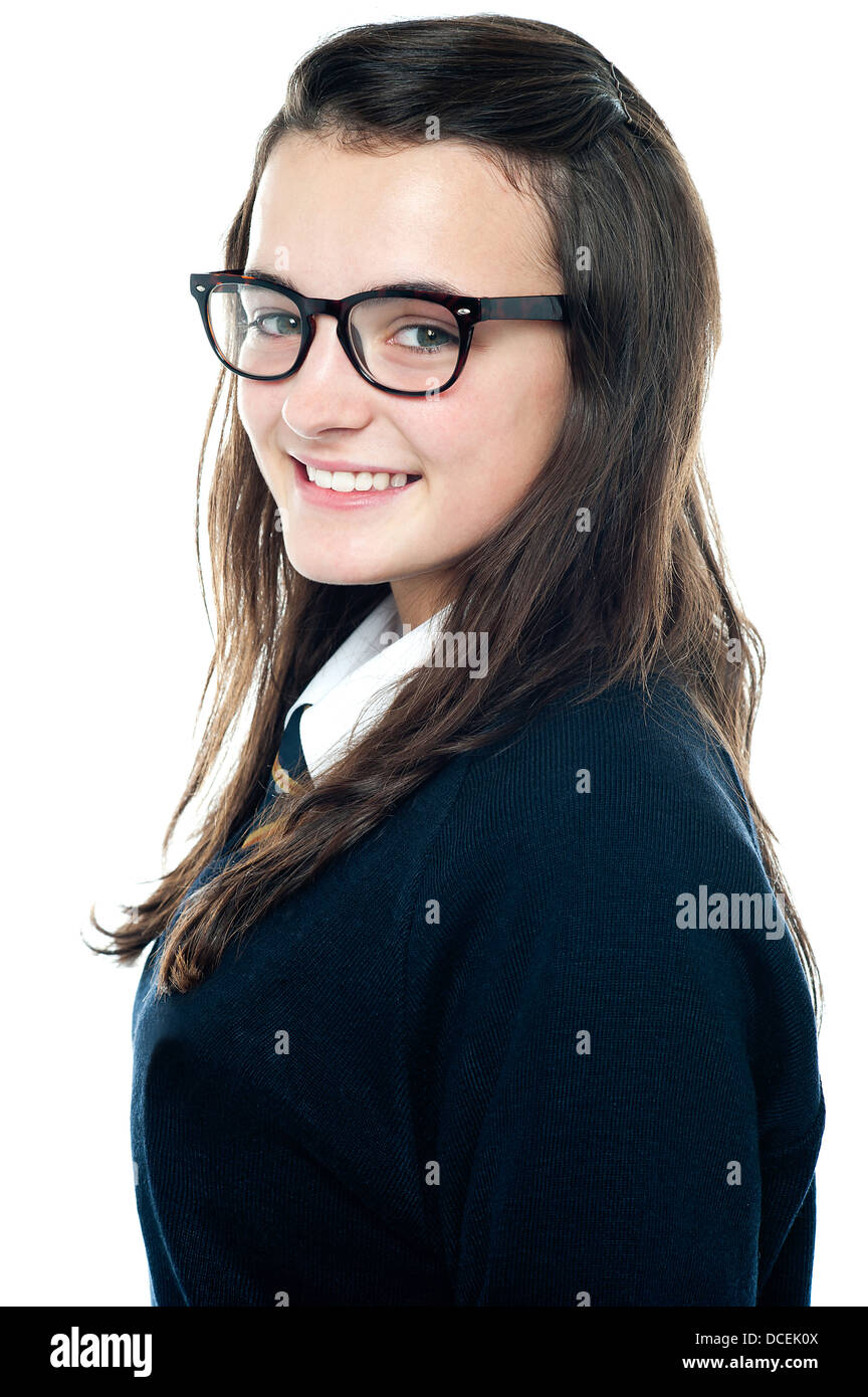 Side view of an adorable teenager wearing spectacles. Close up shot ...