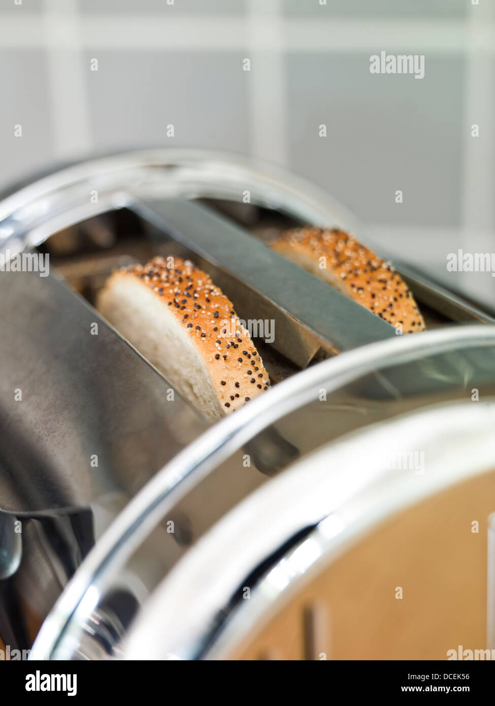 Bread in a Toaster Stock Photo - Alamy