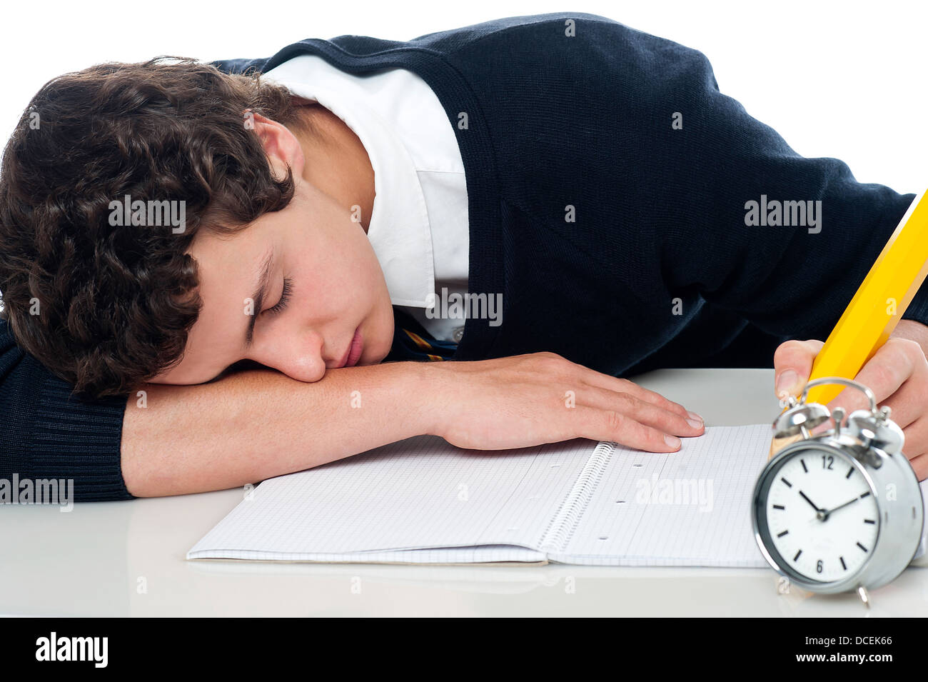 Teenager dozing off while writing his test. Fast asleep Stock Photo - Alamy