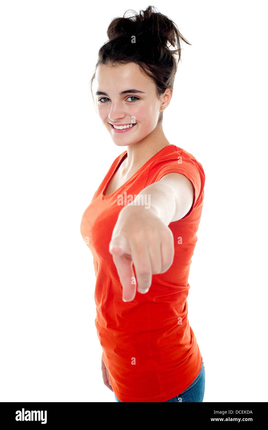 Active pretty girl pointing at you. Isolated over white Stock Photo - Alamy