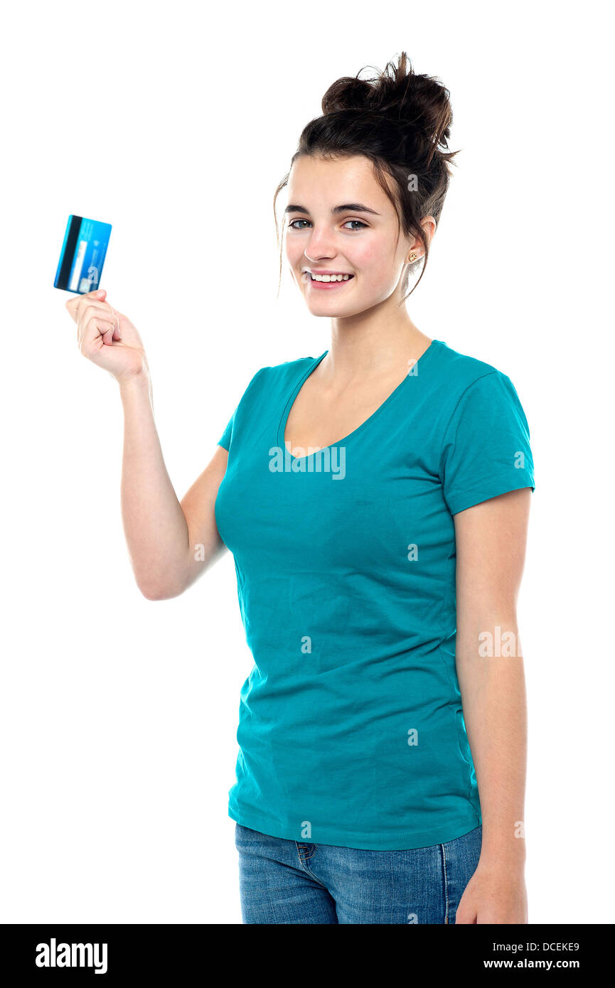 Pretty girl ready to make use of her cash card. Its shopping time ...