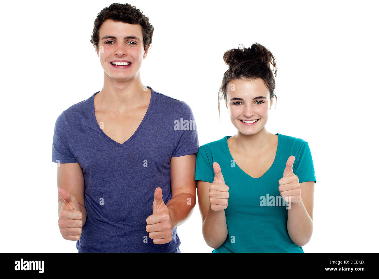 Charming showing thumbs up sign to camera. All the best Stock Photo - Alamy