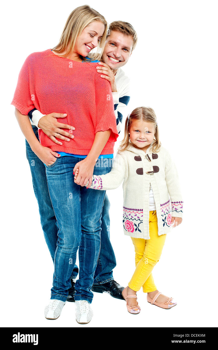 Two young parents with pretty daughter. Isolated on white Stock Photo ...