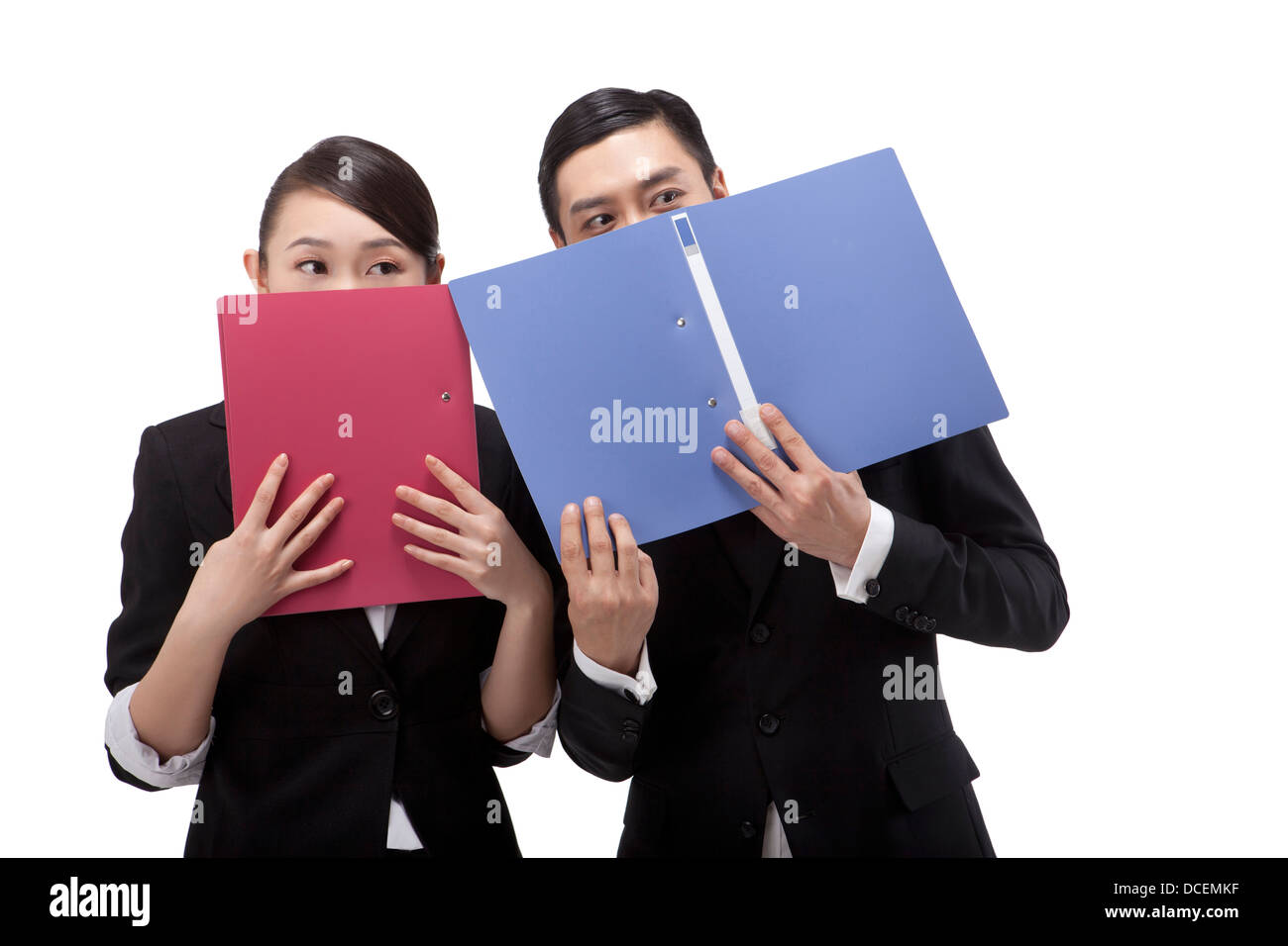 Business people holding a folder with mask Stock Photo - Alamy
