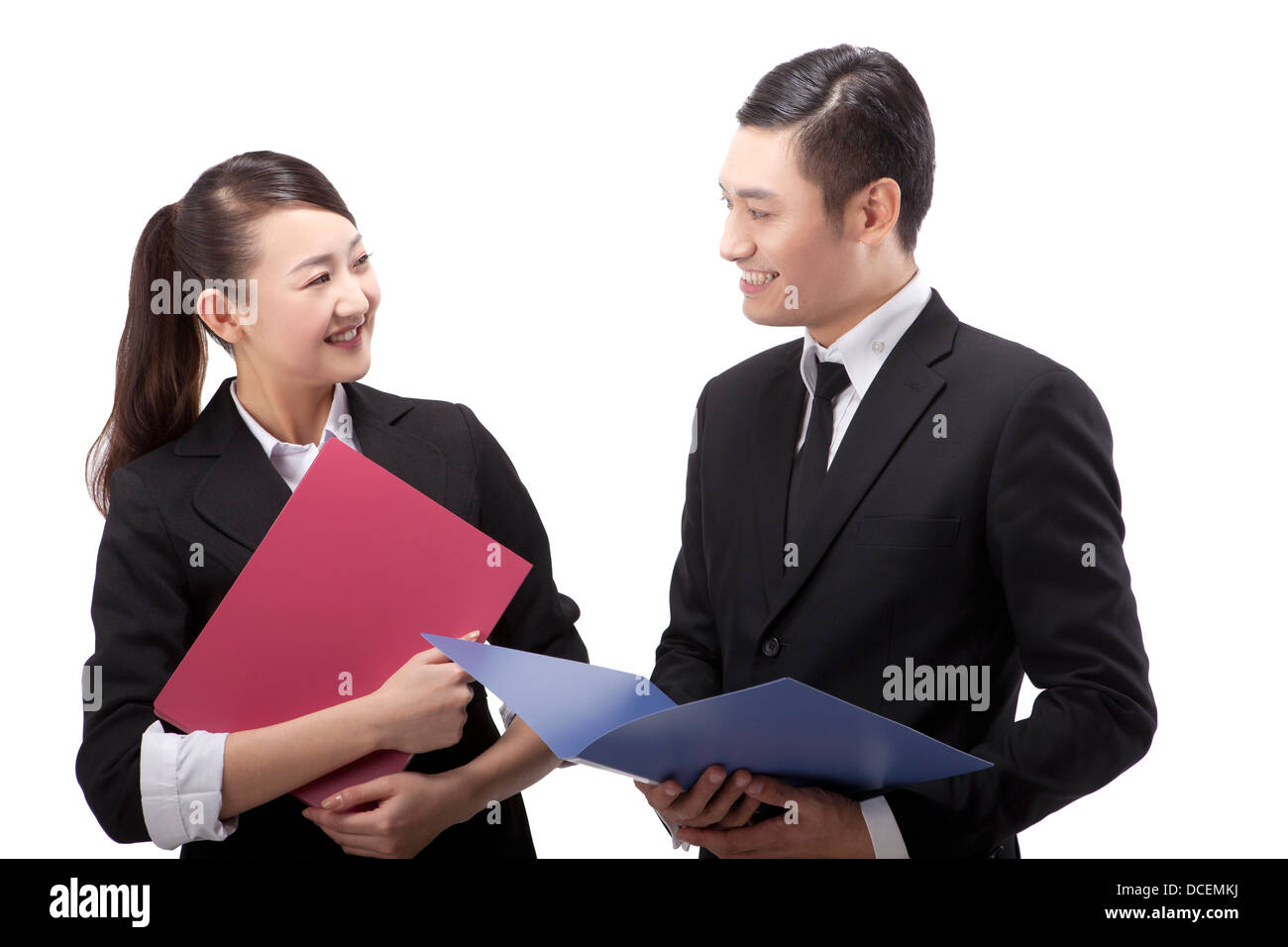 Business people holding a folder Stock Photo - Alamy