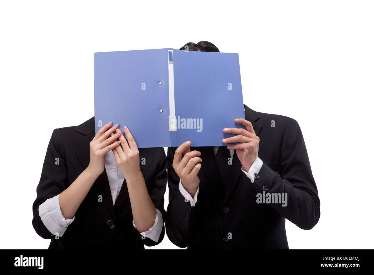 Business people holding a folder block face Stock Photo - Alamy