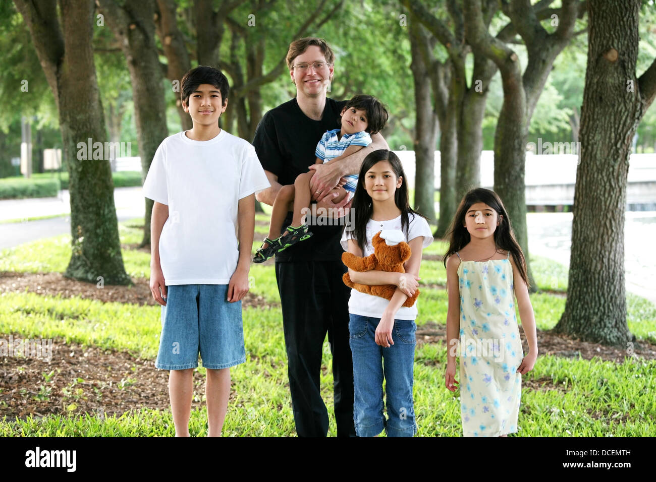 Four happy children enjoy beautiful hi-res stock photography and images ...