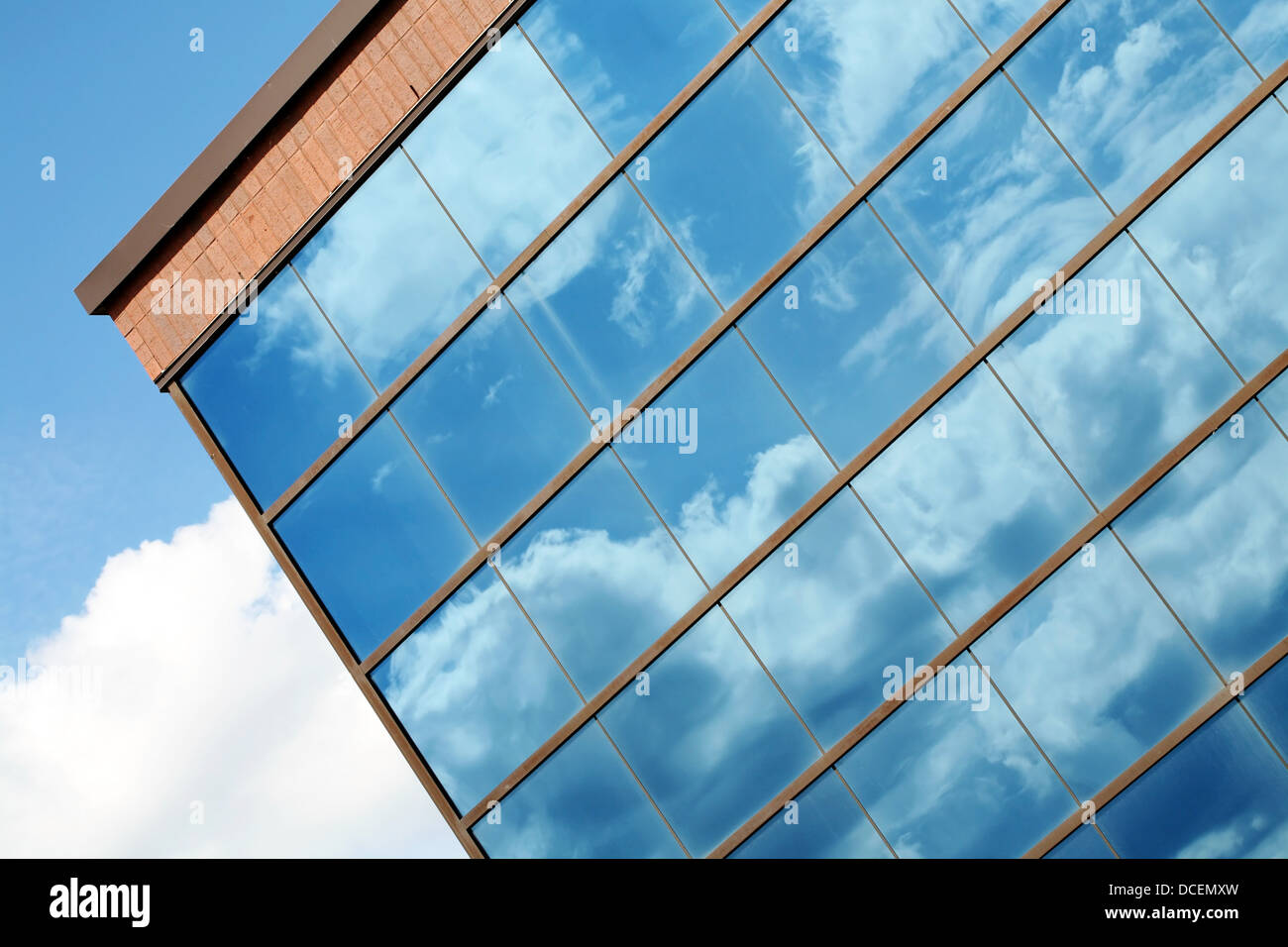 Beautiful clouds reflected in windows Stock Photo - Alamy