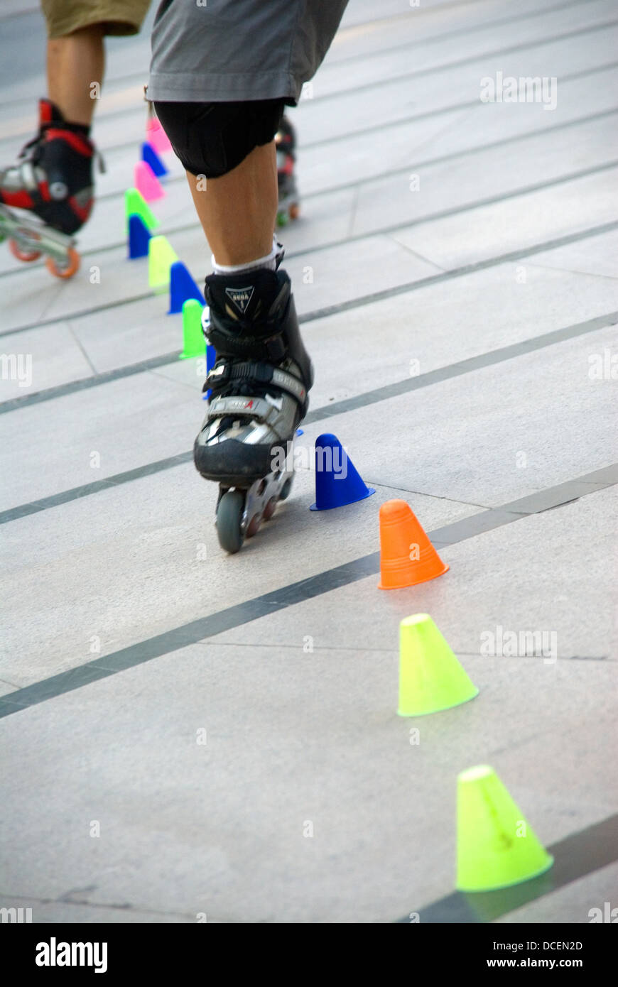 Inline skater cones park hi-res stock photography and images - Alamy