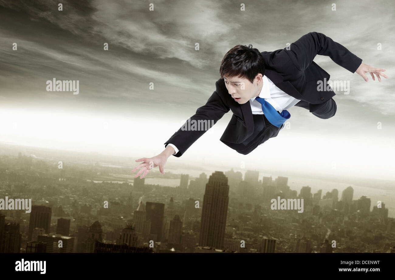 a business man flying Stock Photo - Alamy