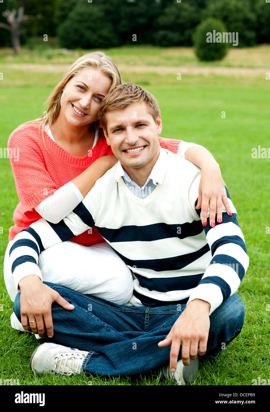 Adorable love couple, woman embracing her man. Nature background Stock ...