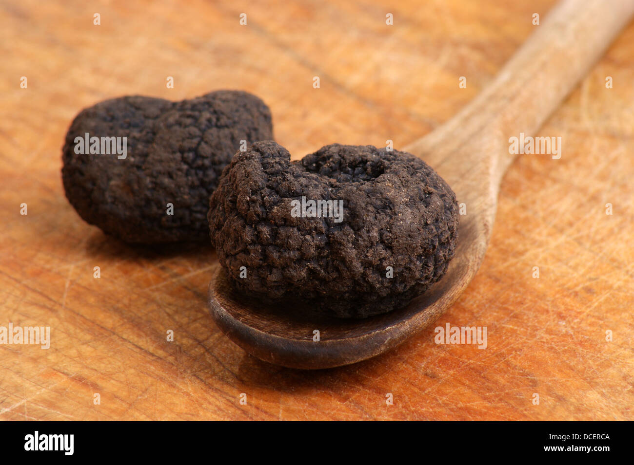 some organic summer truffle on a timber spoon Stock Photo - Alamy