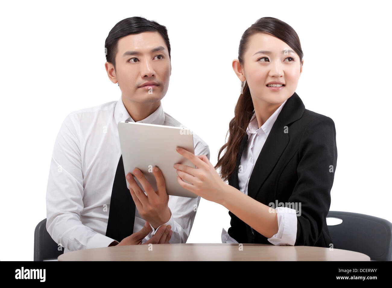 Business people using Ipad Stock Photo - Alamy