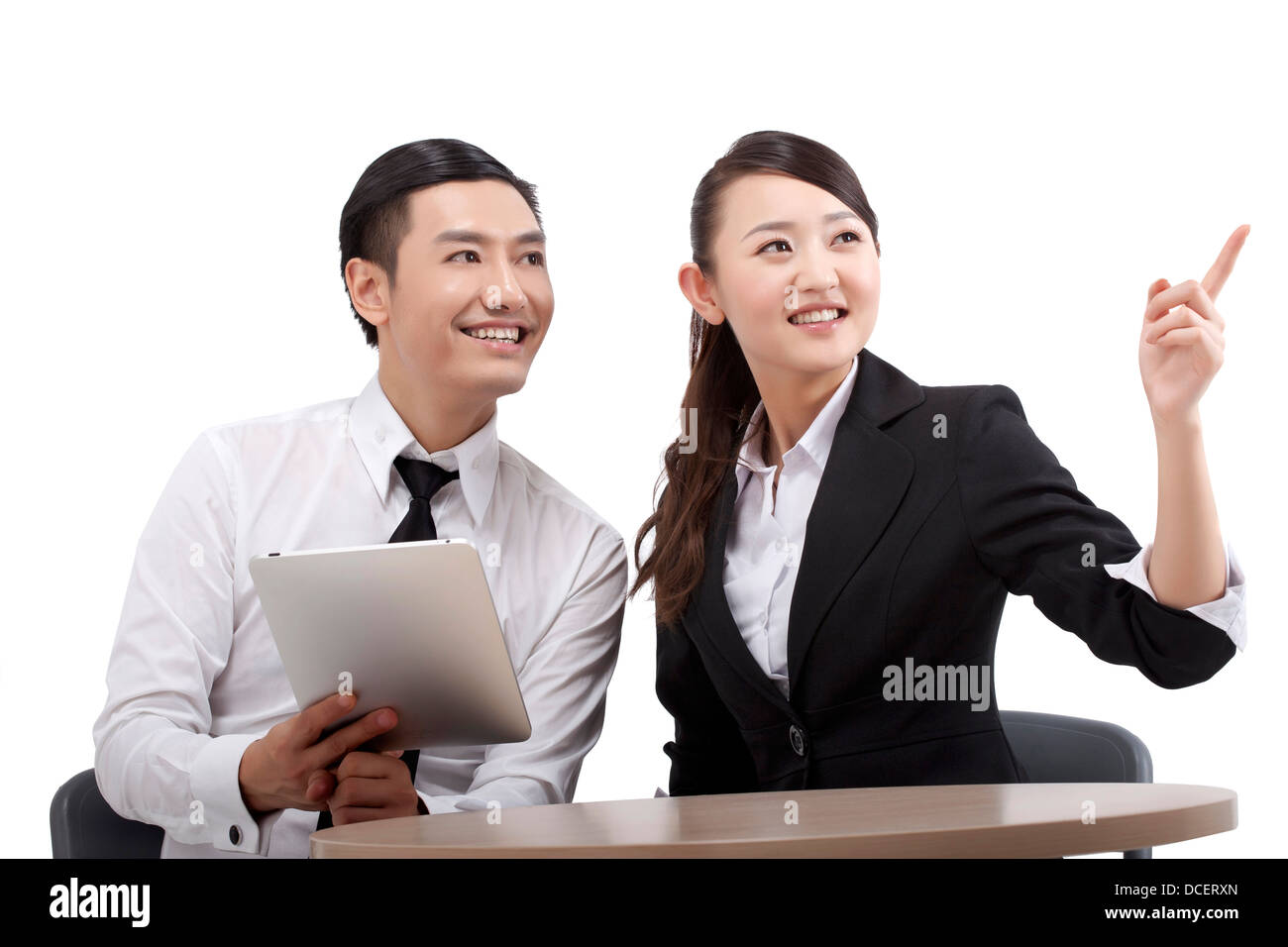 Business people using Ipad Stock Photo - Alamy