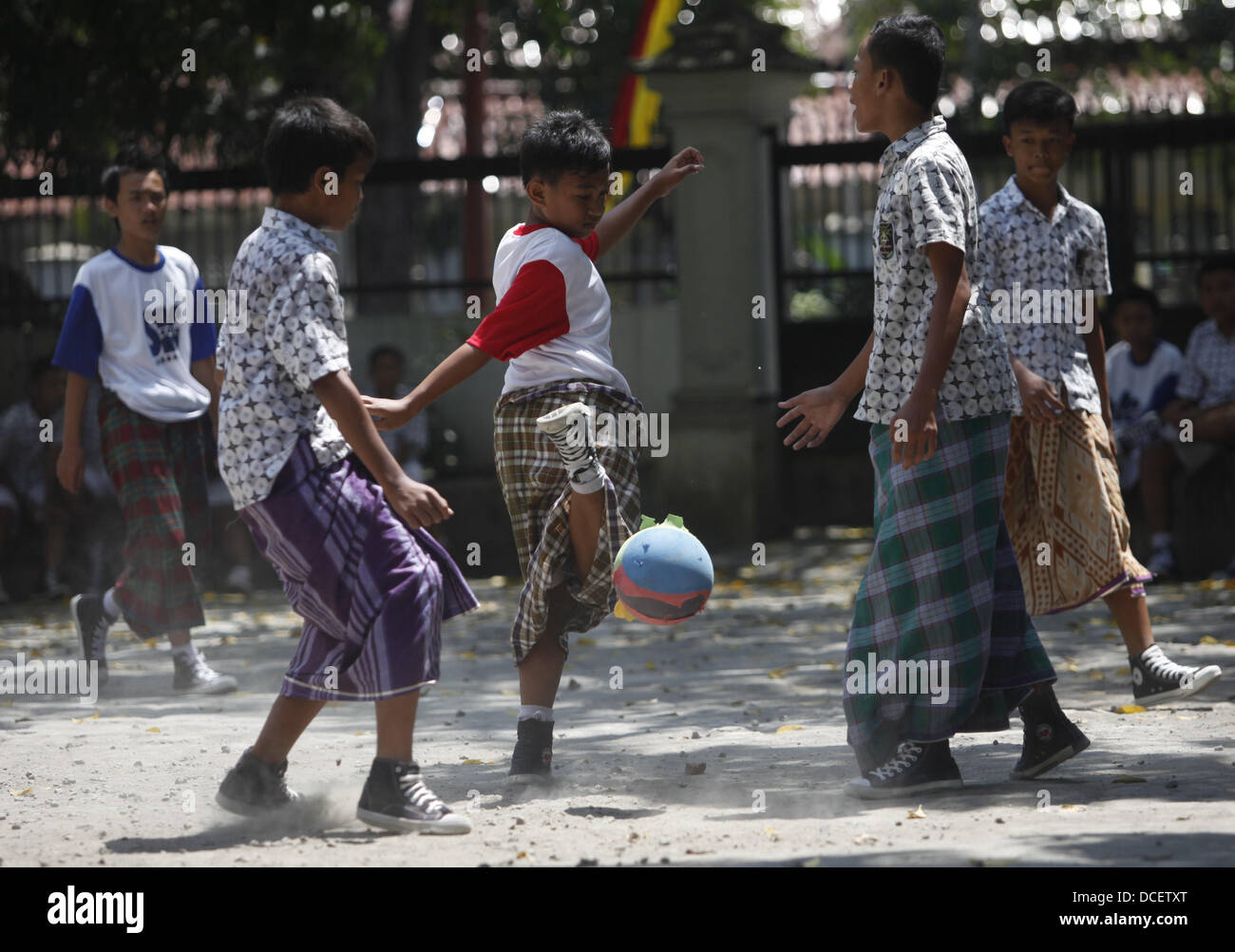 Solo, Java, Indonesia. 16th August 2013. Group of students playing ...