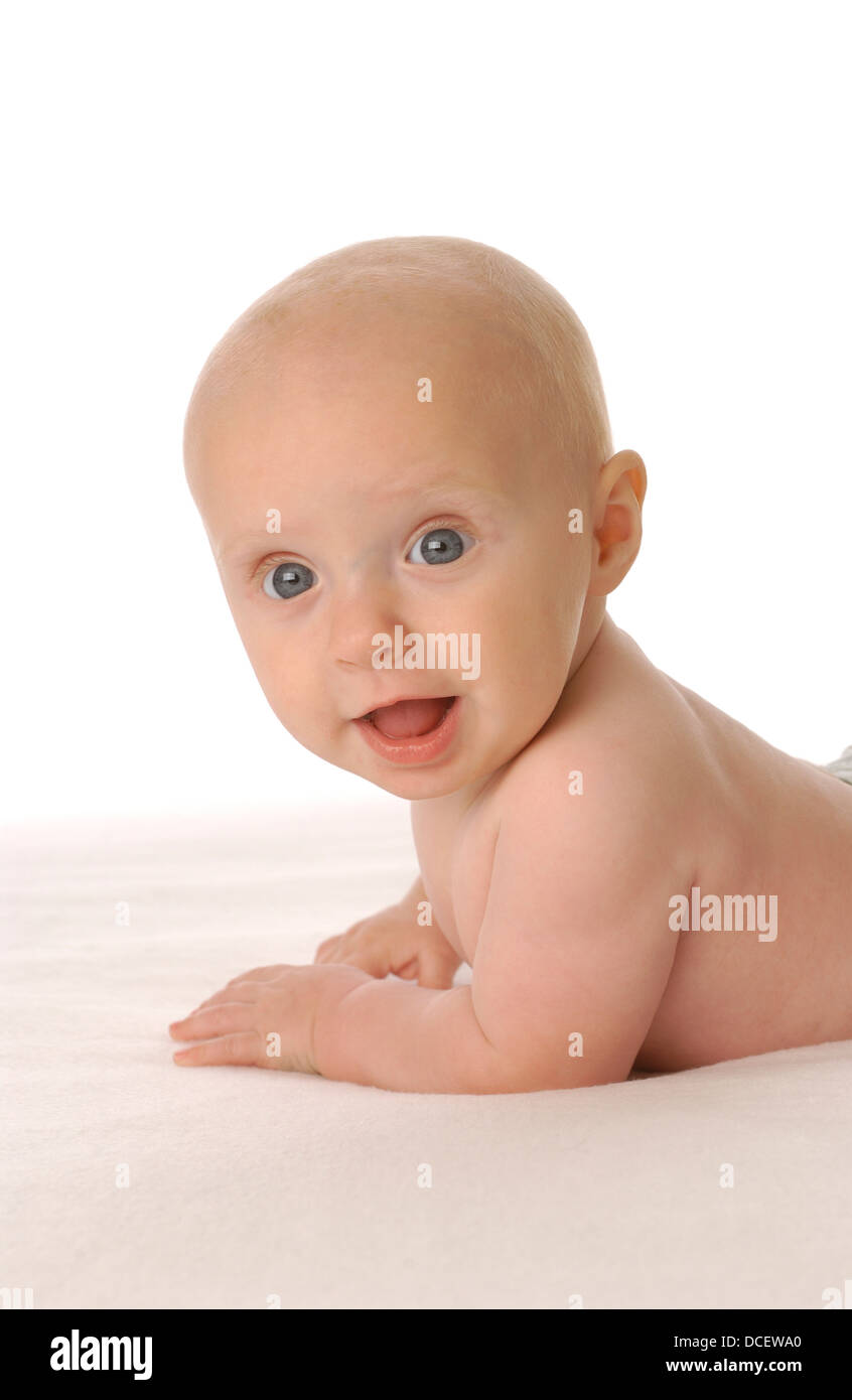 Baby girl lying on her belly Stock Photo - Alamy