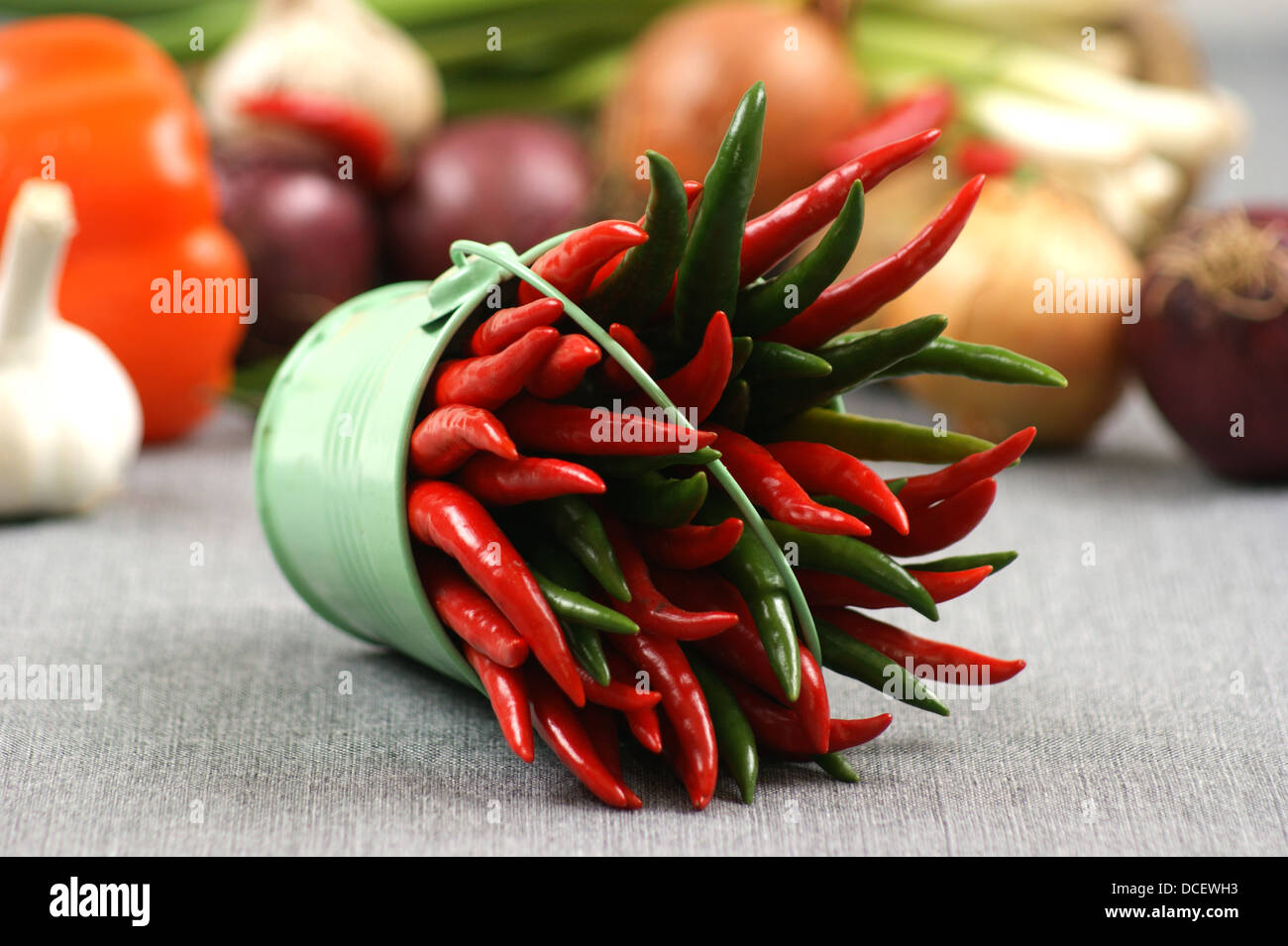 Red green chili in bucket hi-res stock photography and images - Alamy