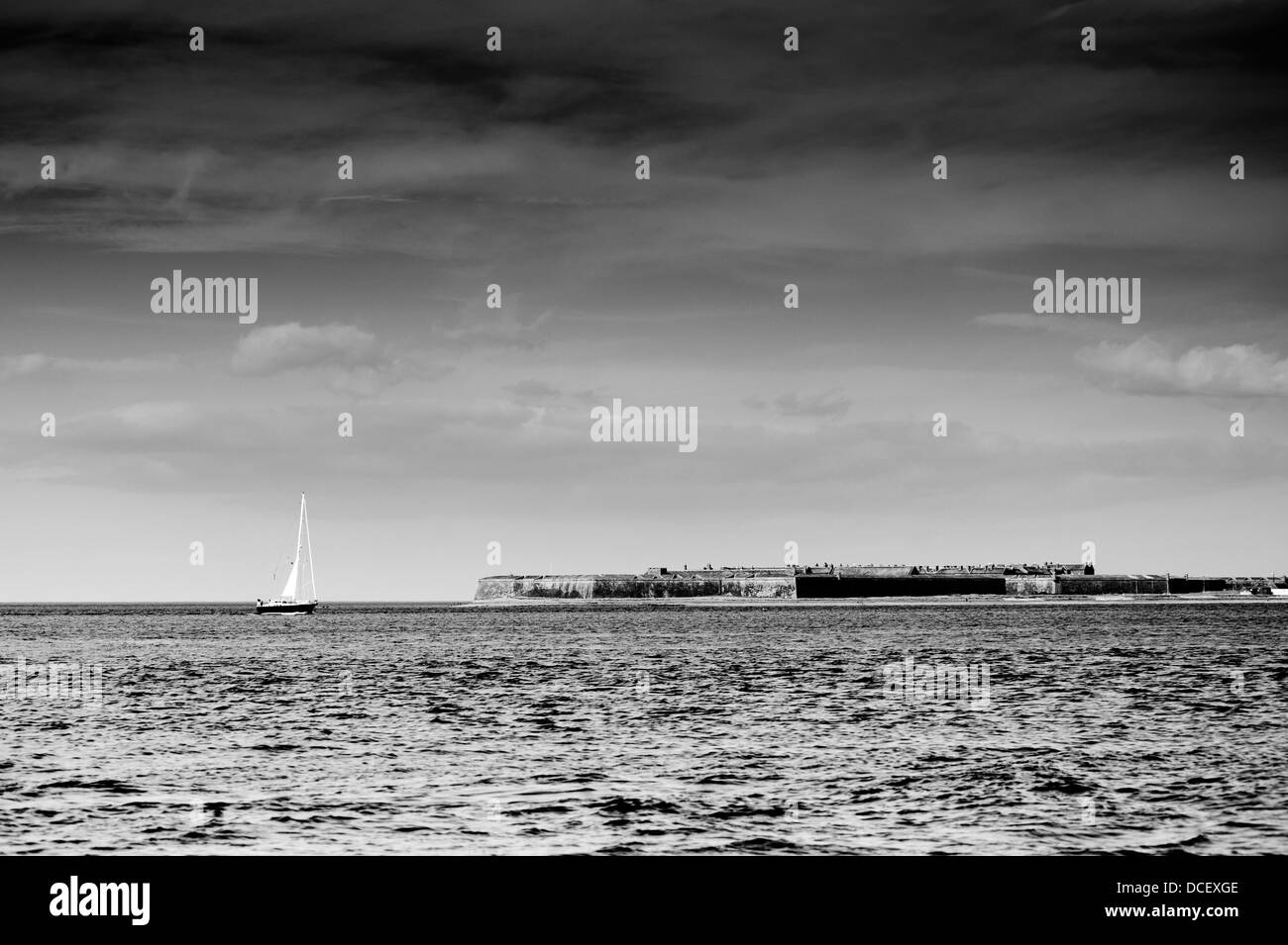 Sailing boat passing Fort George Stock Photo - Alamy