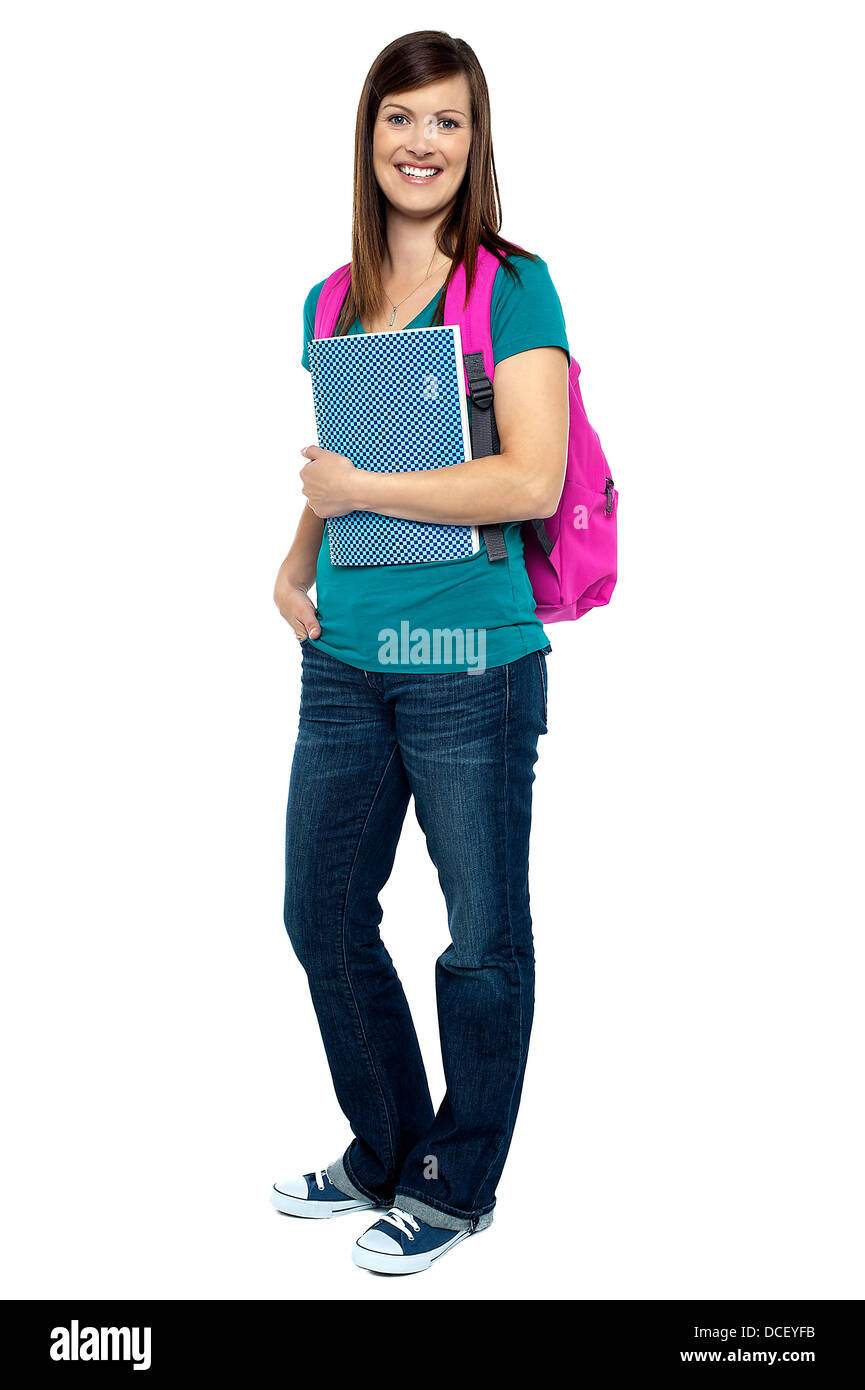 Full Length Portrait Of Pretty College Girl Carrying Pink Backpack