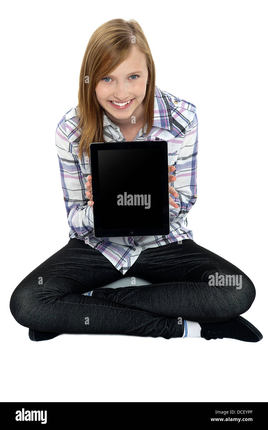 Its time for you to buy newly launched touchpad device. Teen girl ...