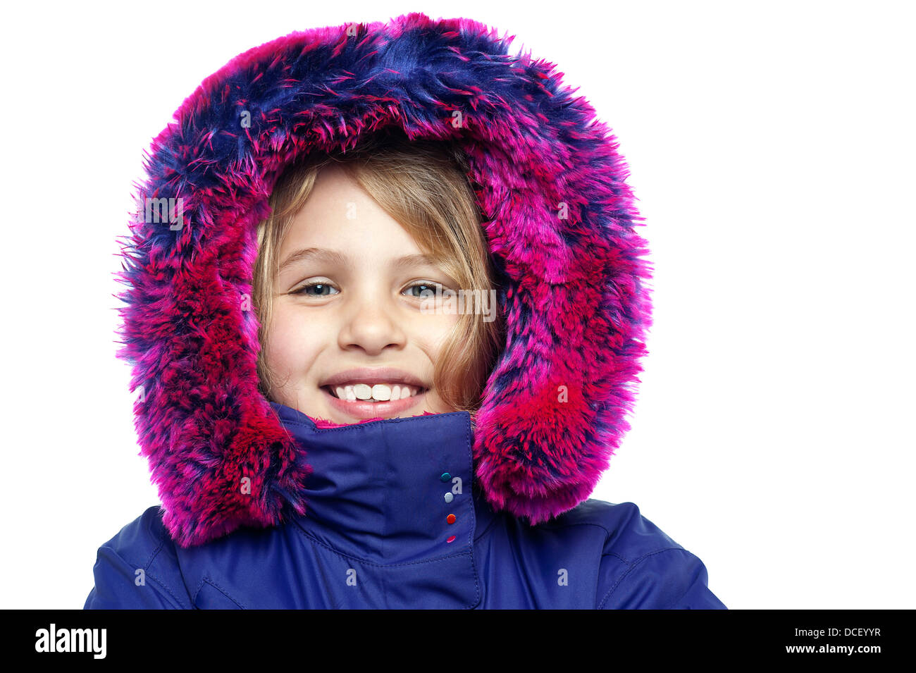 Face closeup of a beautiful female child in eskimo jacket, white ...