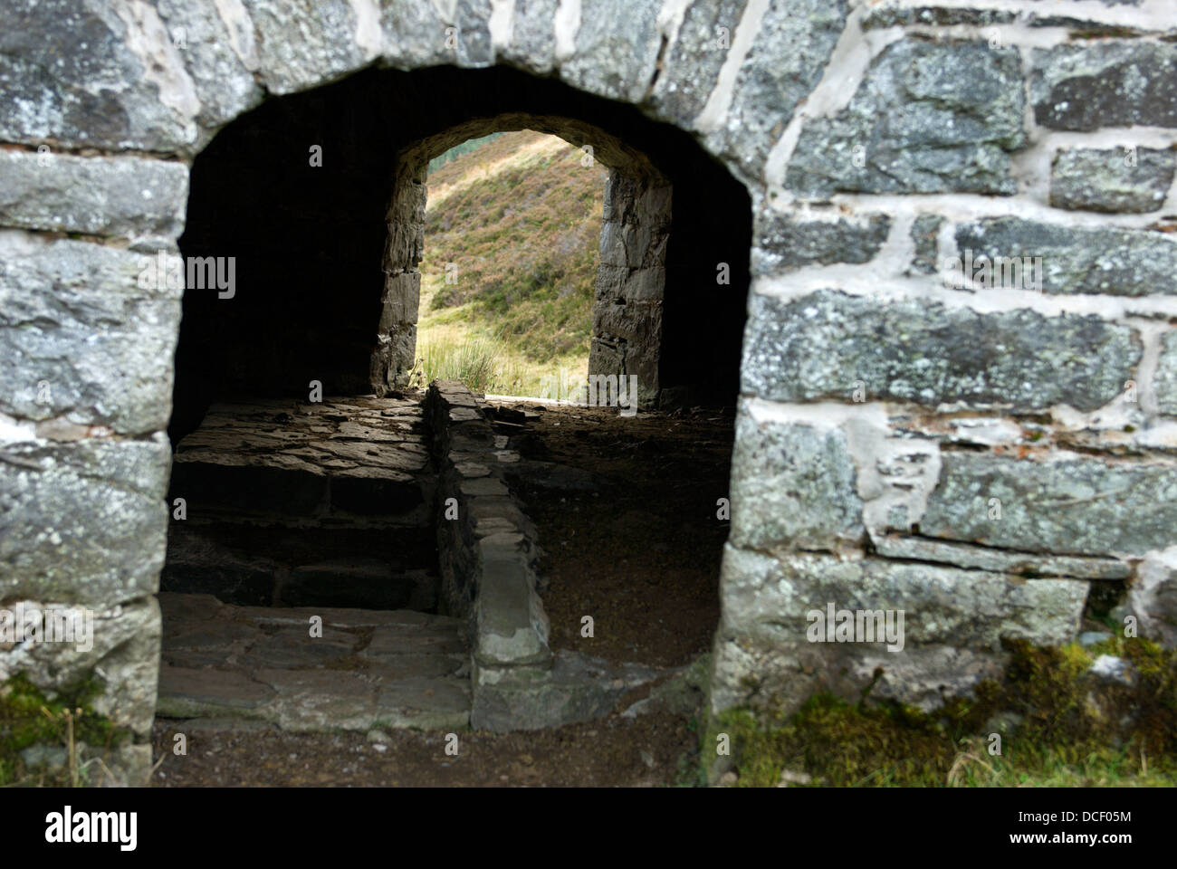 Close up of the arched doorway into the disused Lecht Iron Mine ...