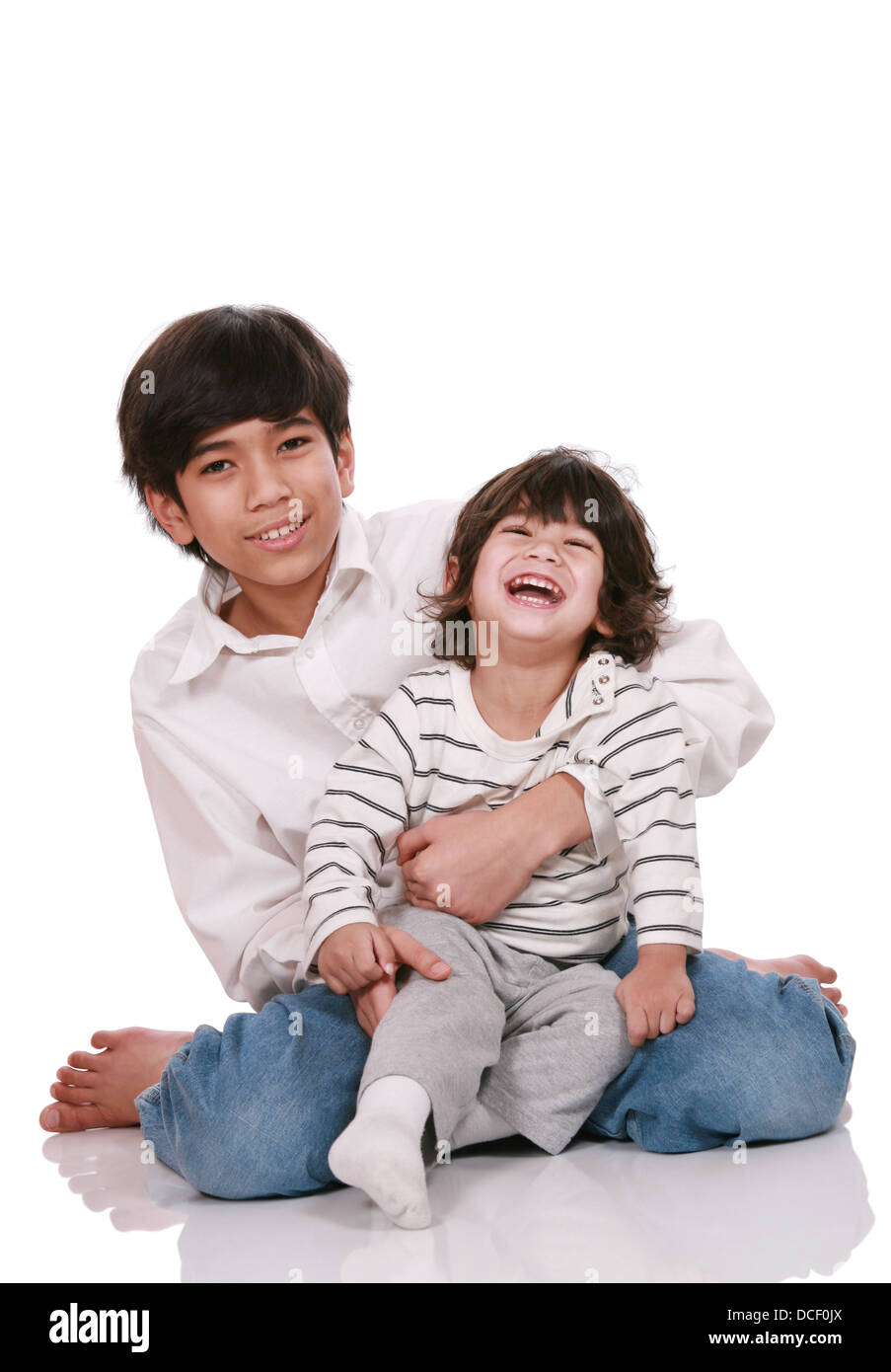 Two brothers laughing together Stock Photo - Alamy