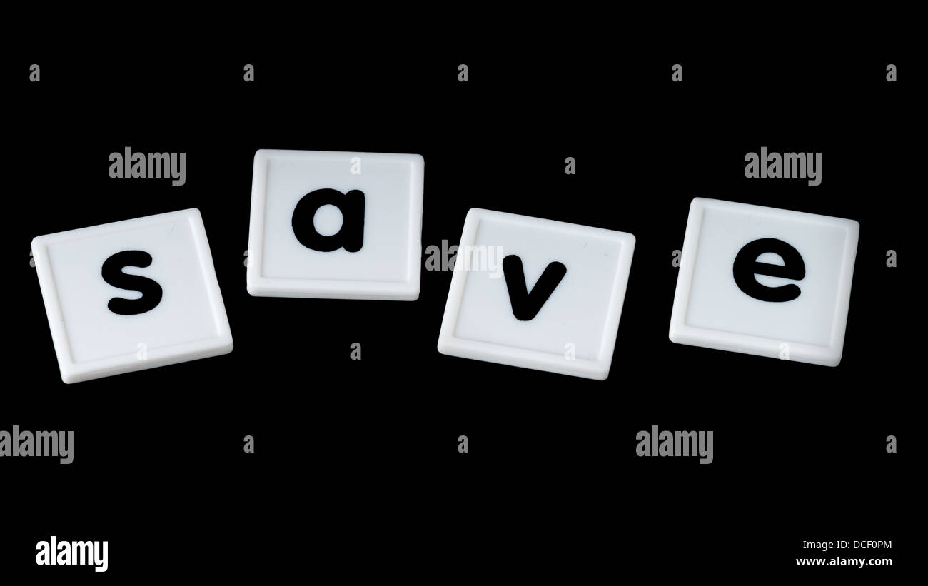 Save spelled in game letters isolated on black background Stock Photo ...