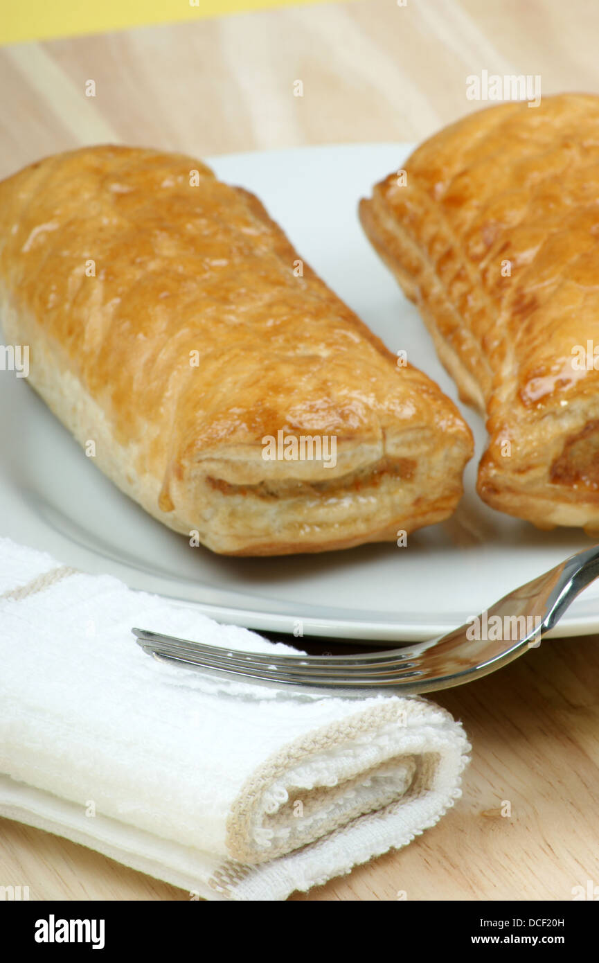 Eating mini sausage rolls hi-res stock photography and images - Alamy