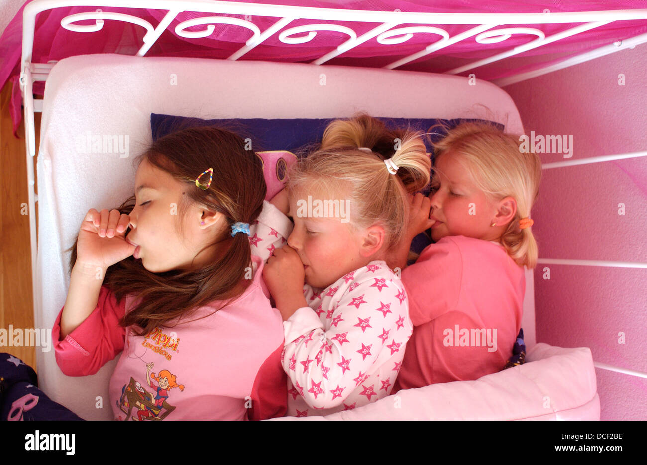 Three sleeping girls Stock Photo - Alamy