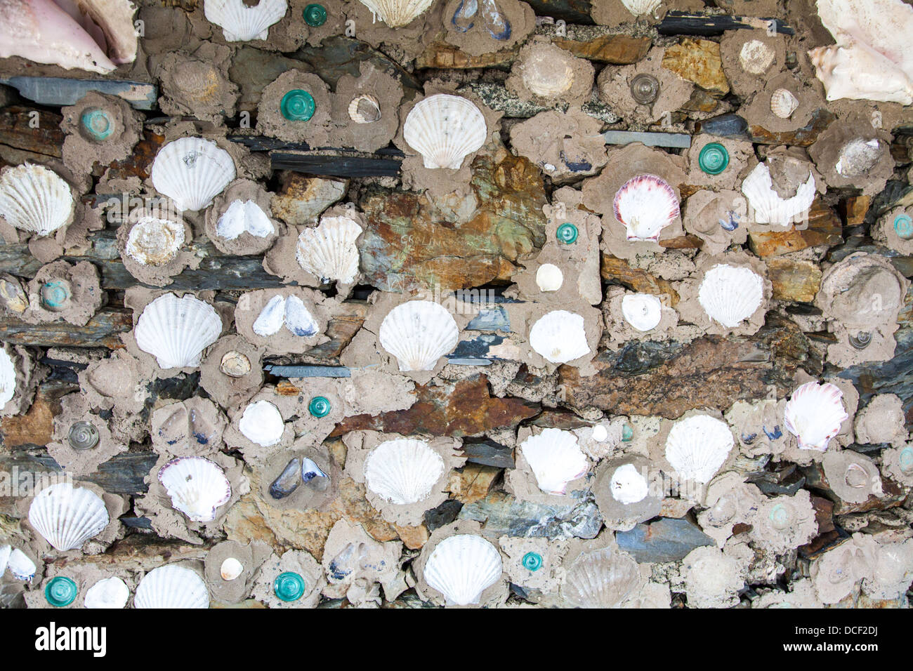 Shells embedded in a wall of one the buildings at Portmeirion, Wales ...