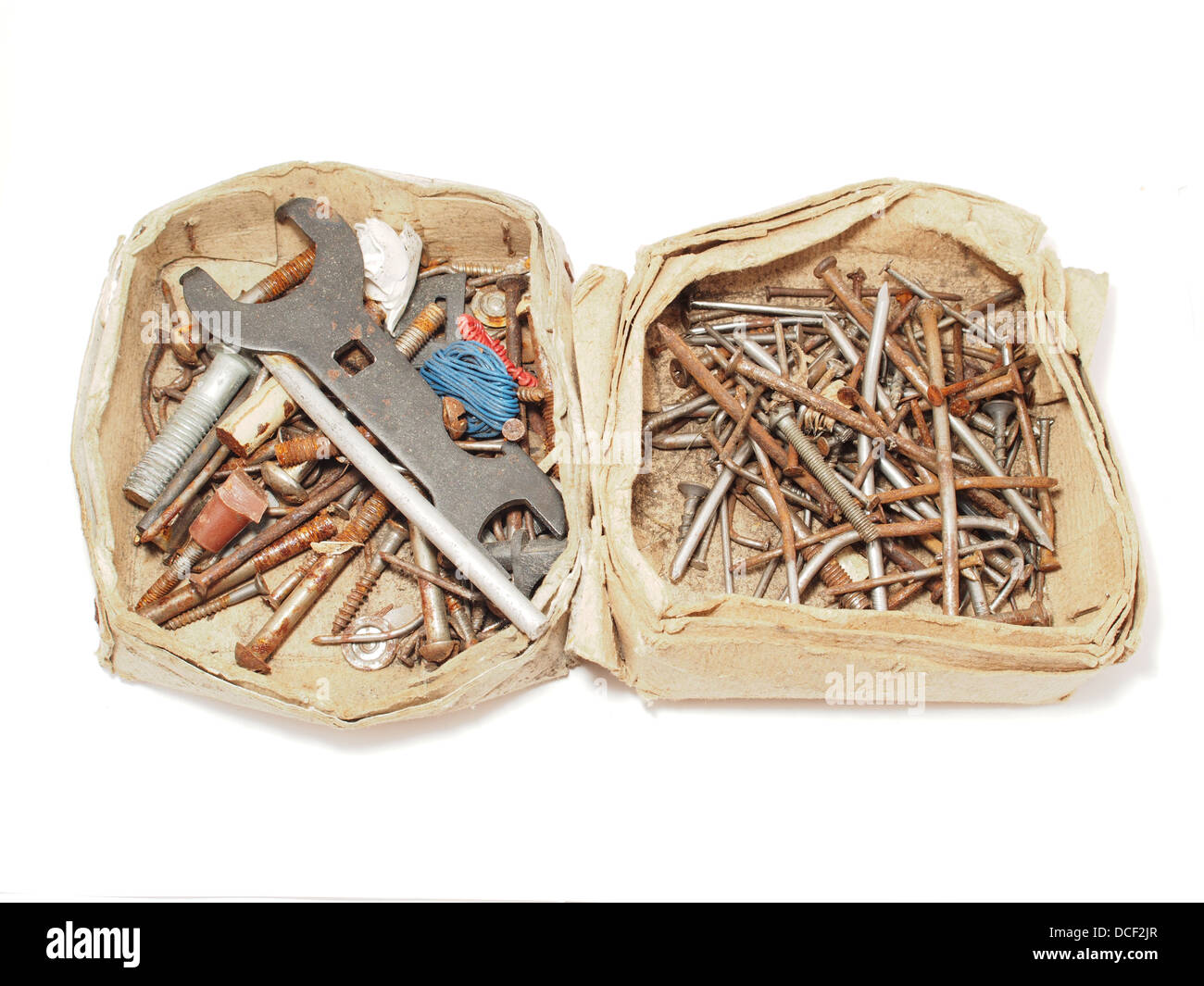 box of nails and tools on a white background Stock Photo - Alamy