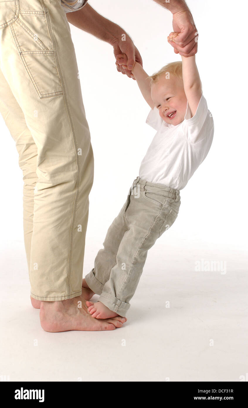Father and son playing together Stock Photo - Alamy