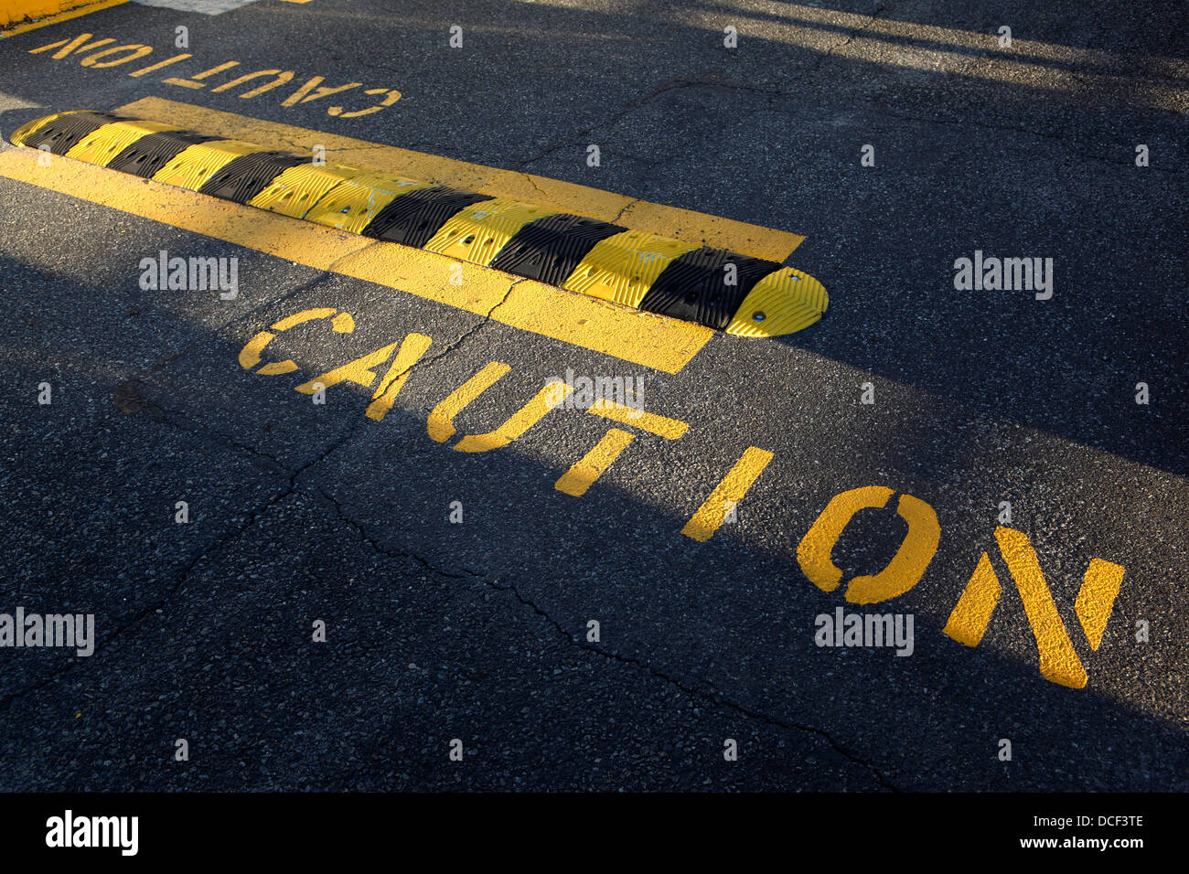Yellow slow road markings hi-res stock photography and images - Alamy