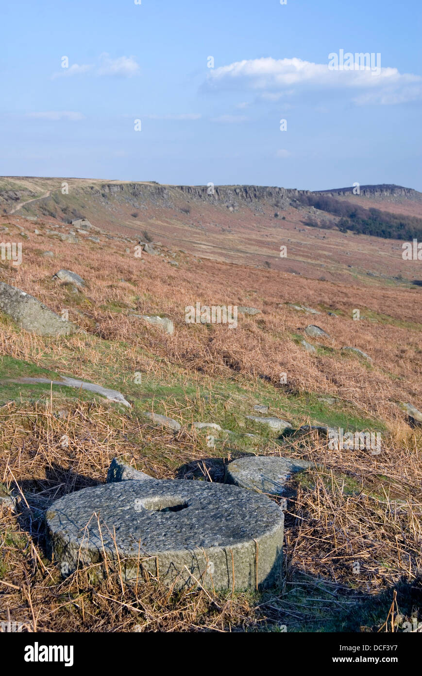 Millstone lying abandoned in situ at the old quarry site at Stanage ...