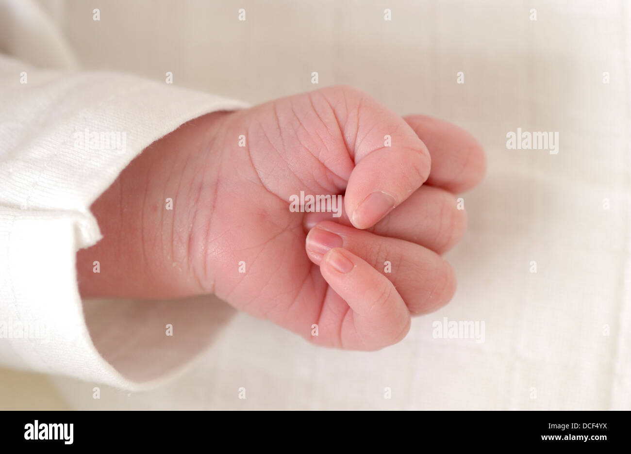 Tiny baby hand Stock Photo - Alamy