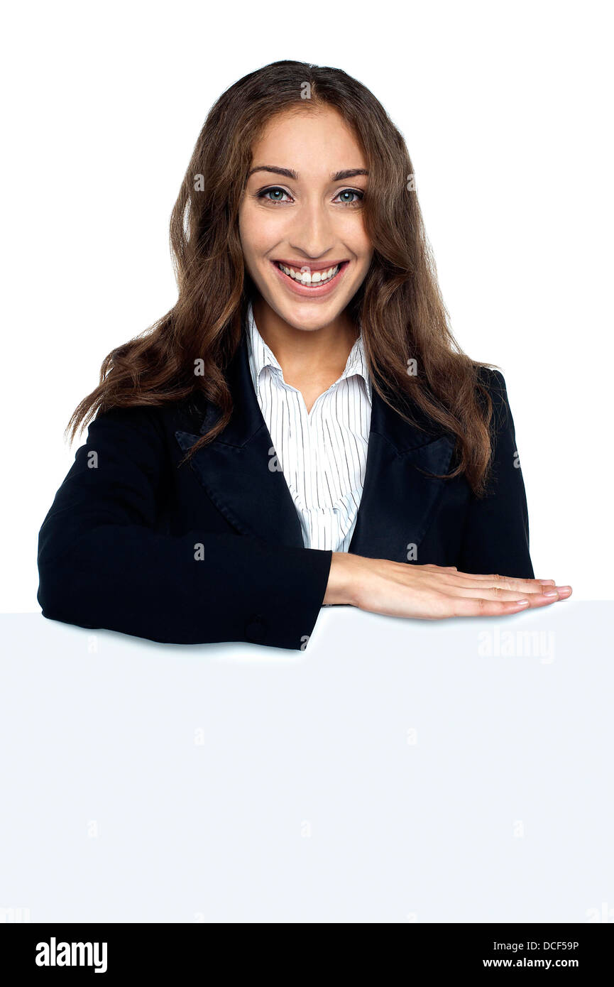 Female executive behind blank white ad board, business concept Stock ...