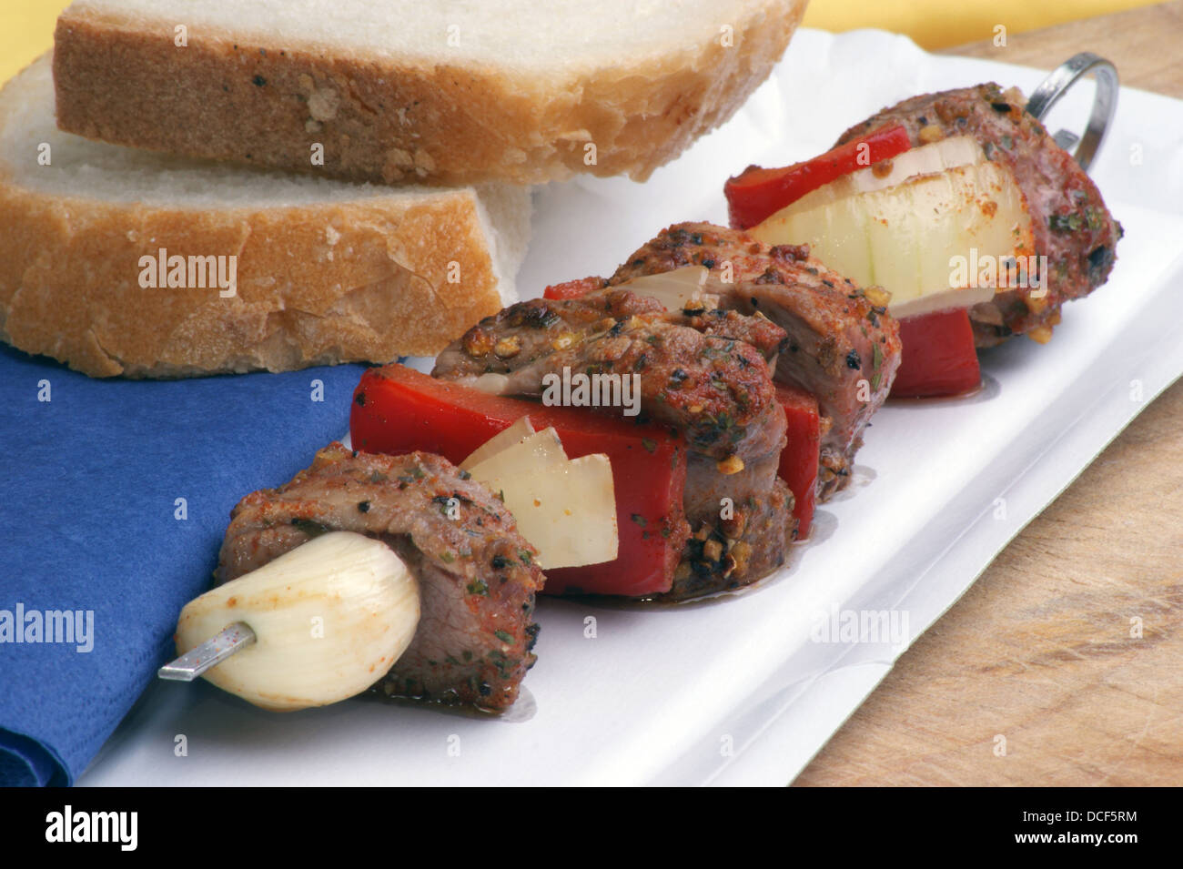home made shashlik with bread on a paper plate Stock Photo - Alamy