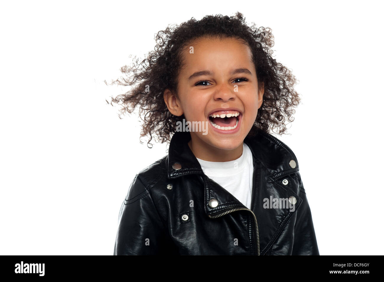 Profile shot of an elementary kid laughing heartily. Truth in her laugh ...