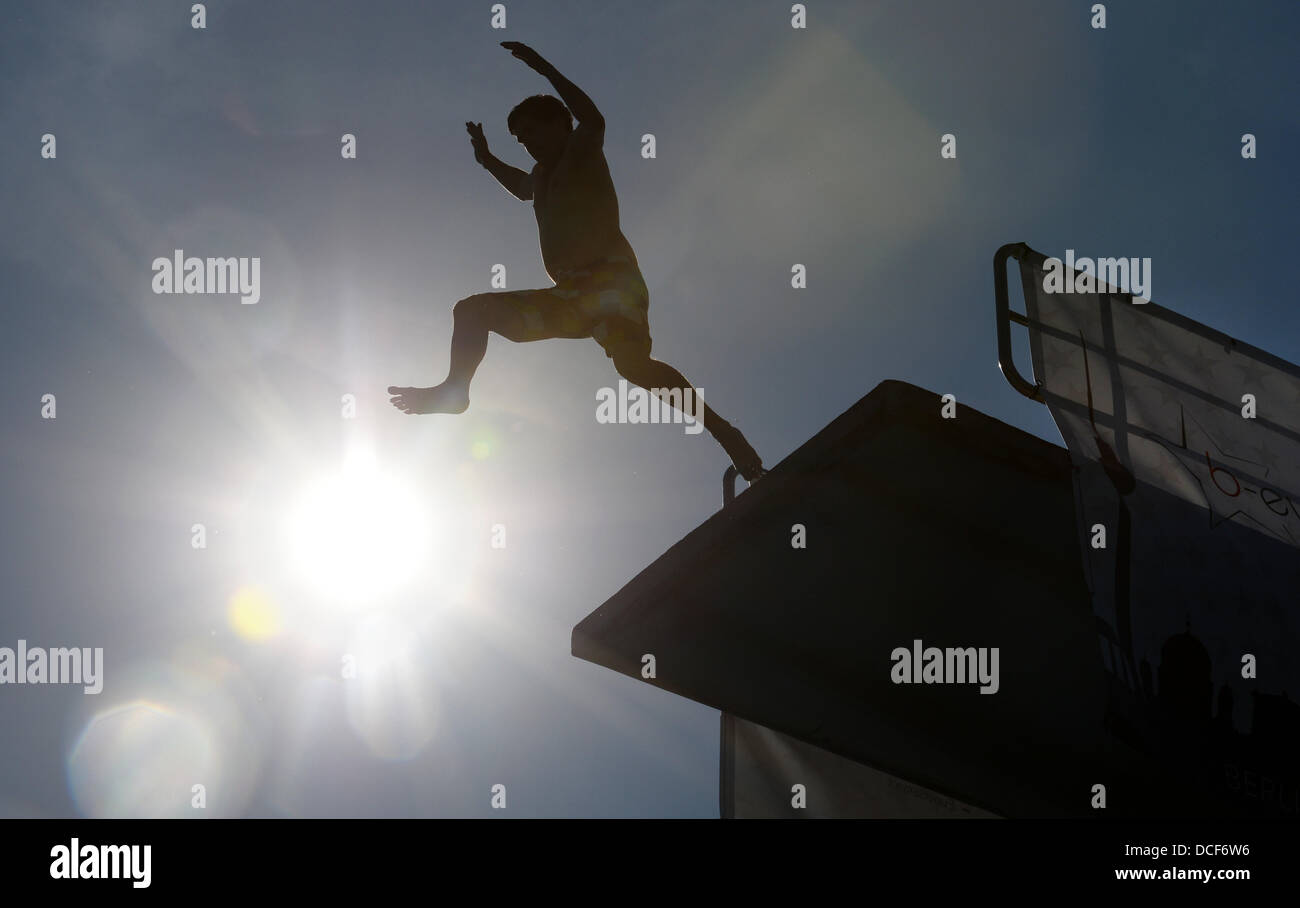 Berlin, Germany. 16th Aug, 2013. A participant takes a test jump during ...