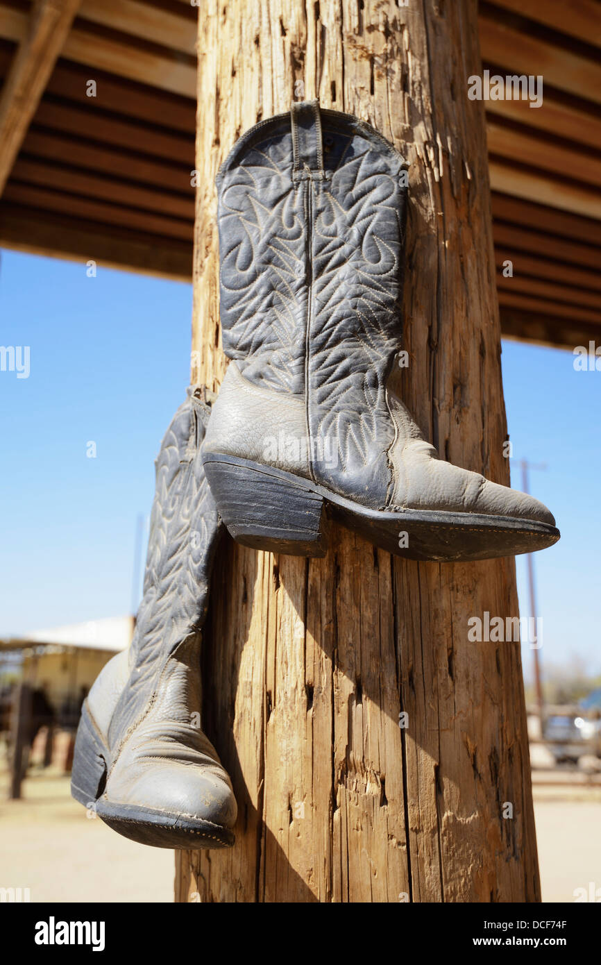 Cowboy Boots Hanging From A Post At A Riding Ranch;Arizona Usa Stock ...