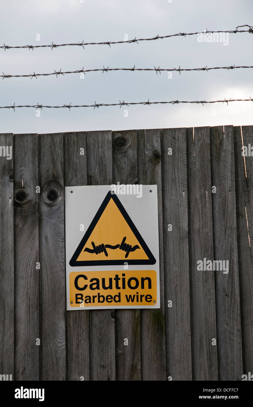 Barbed Wire signs Stock Photo - Alamy