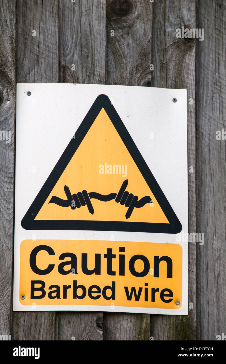 Barbed Wire sign Stock Photo - Alamy