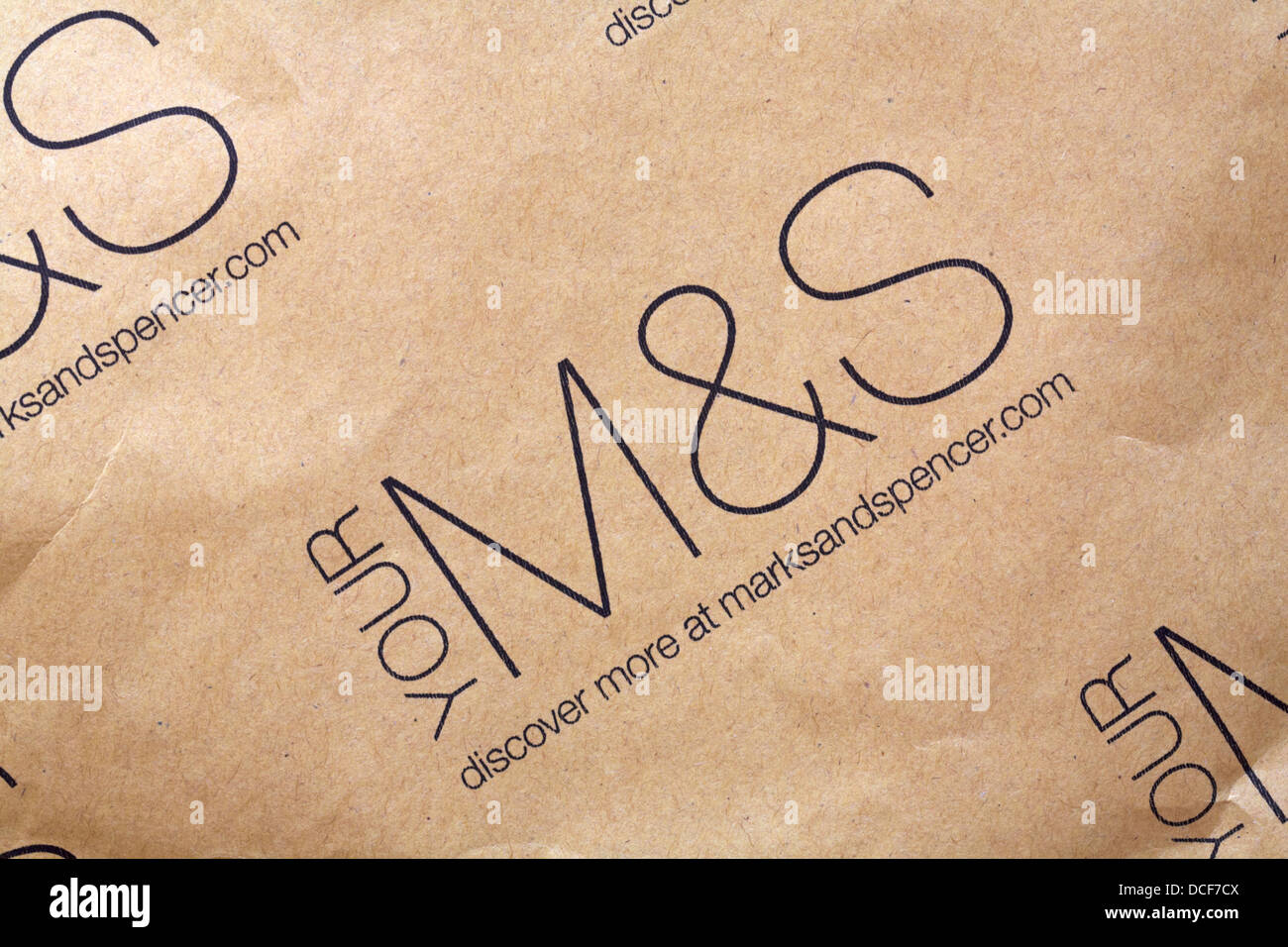 Your M&S discover more at marksandspencer.com on brown envelope Stock ...