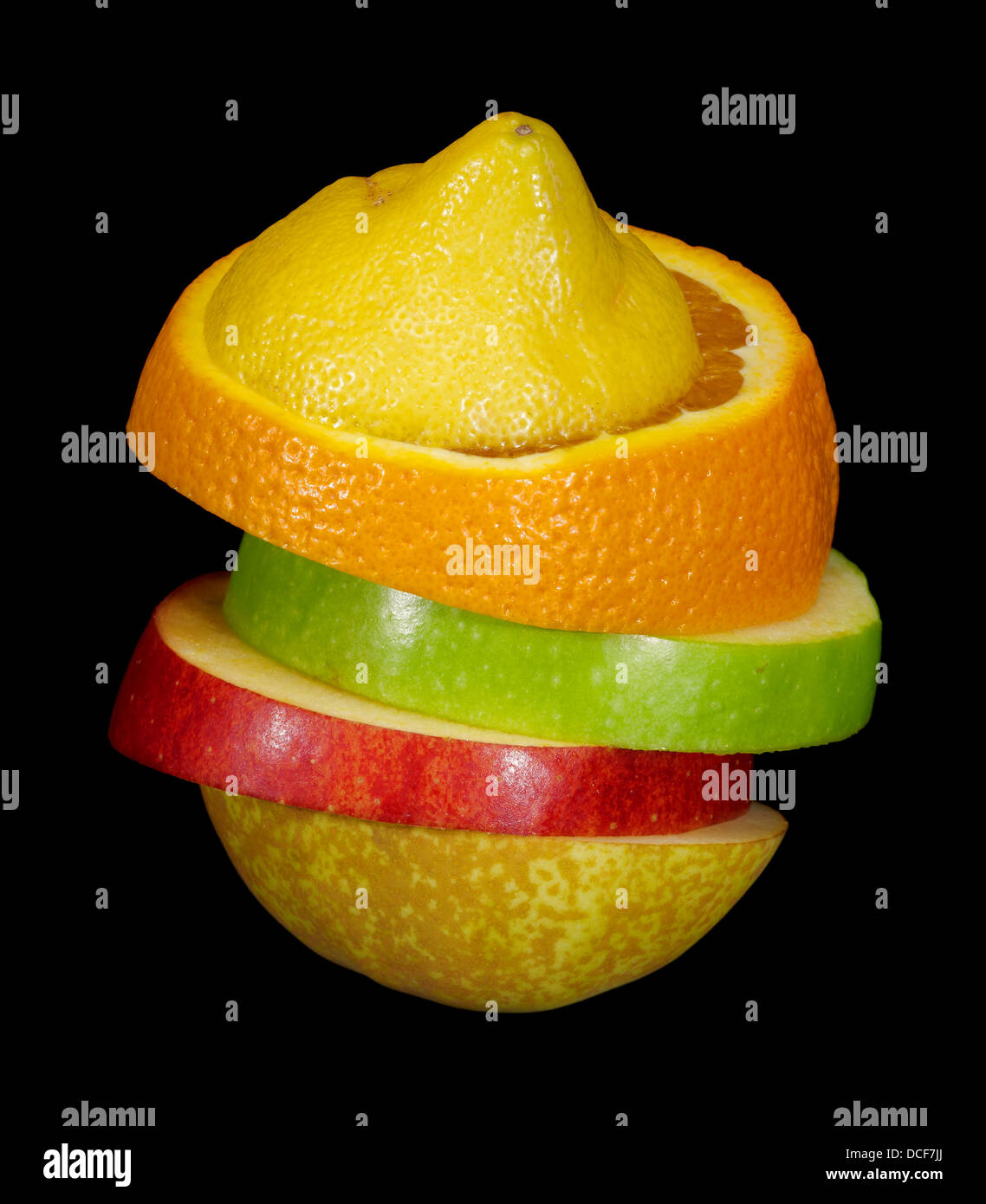 composite fruit made of various fruit slices in black back Stock Photo ...