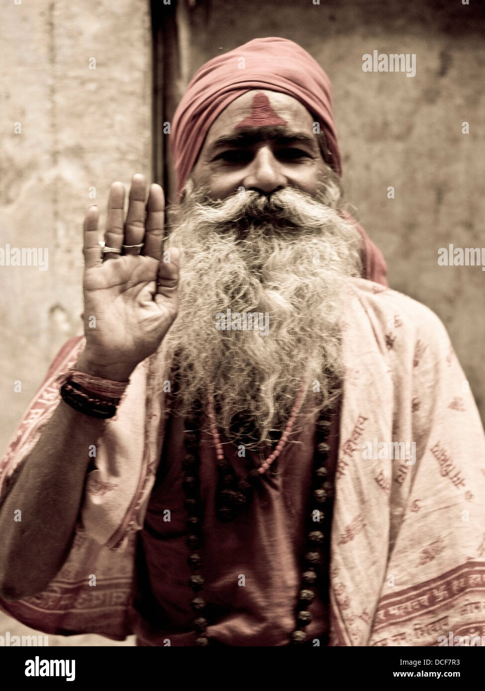 Holy man sadhu hand up hi-res stock photography and images - Alamy